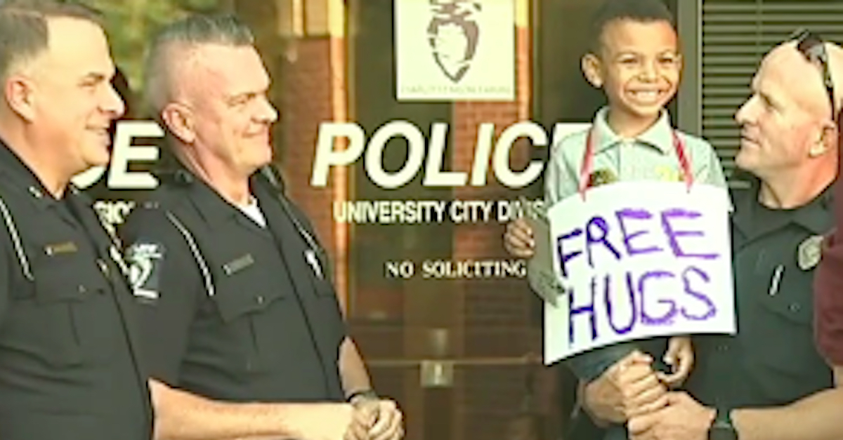 5-Year-Old Shows Up At Police Station With Treats And 'Free Hugs' To ...