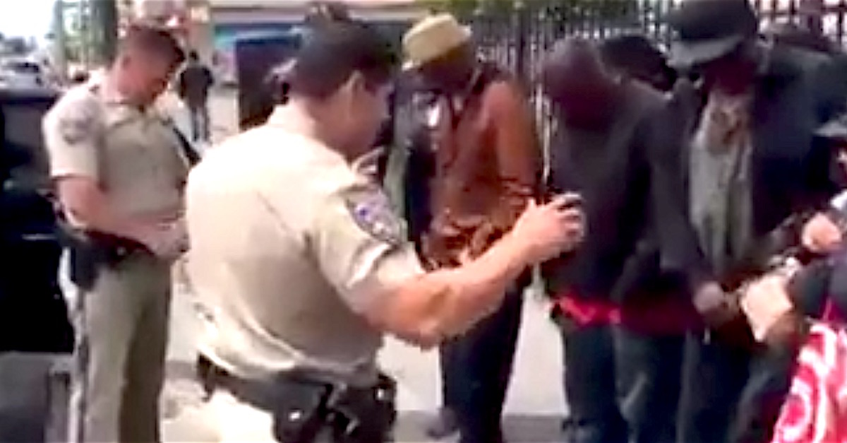Cops Line Up Homeless People On The Road For A Prayer Before Giving ...