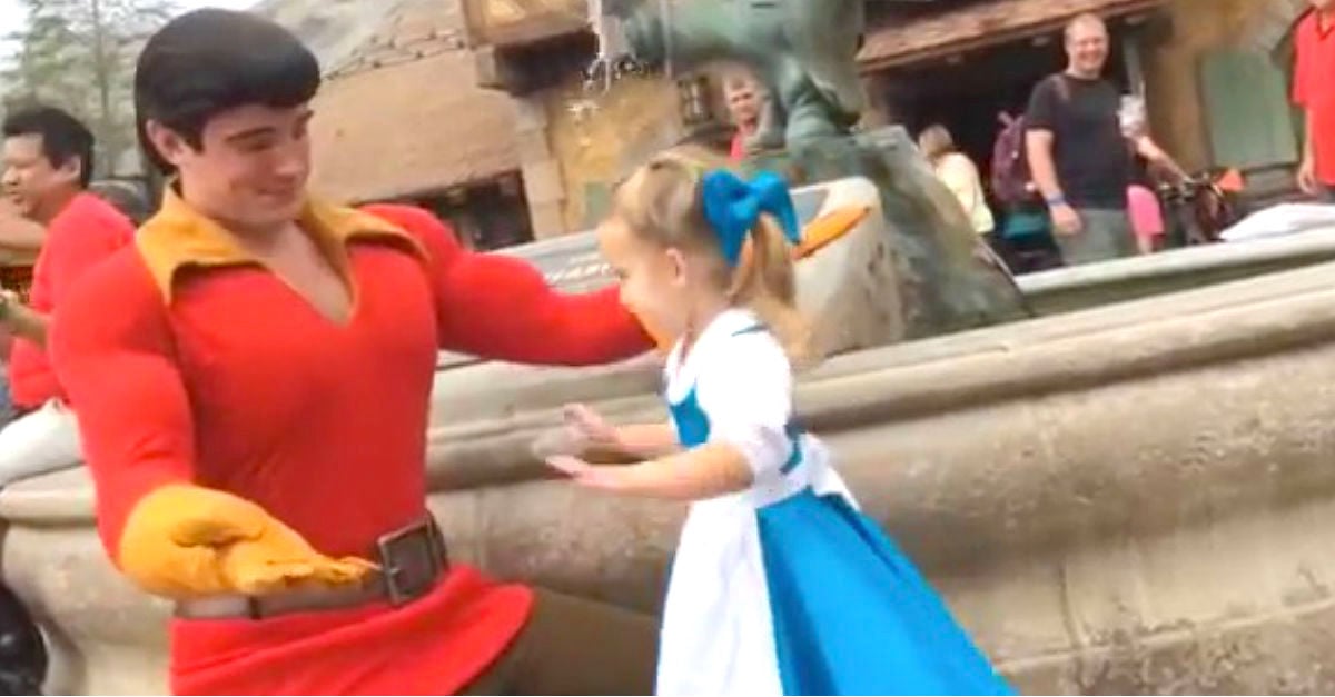 He Reaches For A Hug From The Little Girl, But Keep An Eye On Her Hands...