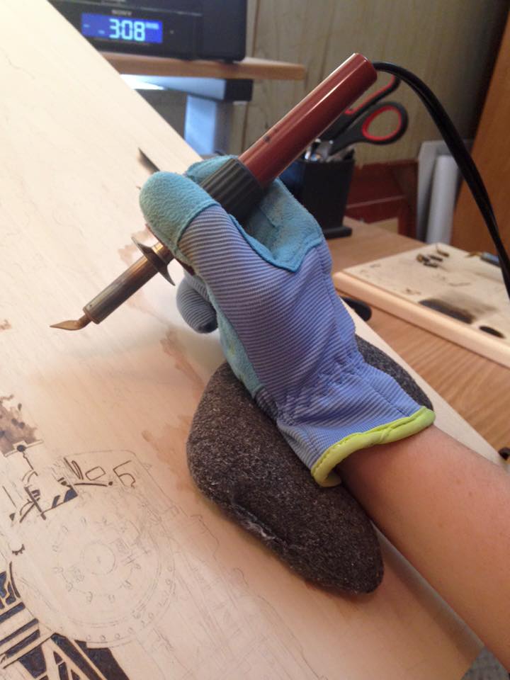 She Burns A Bear Into A Piece Of Wood, But When It's Filled In? Beautiful!